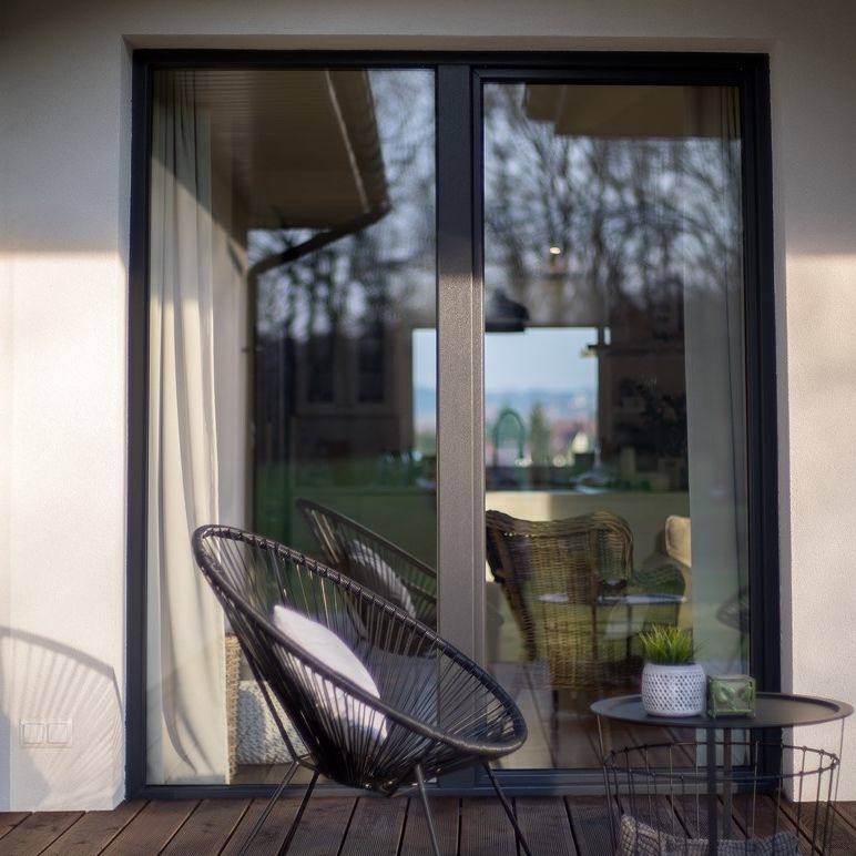 Baie vitrée levante-coulissante - PRIMO - WISNIOWSKI - en PVC / à double vitrage / à triple vitrage