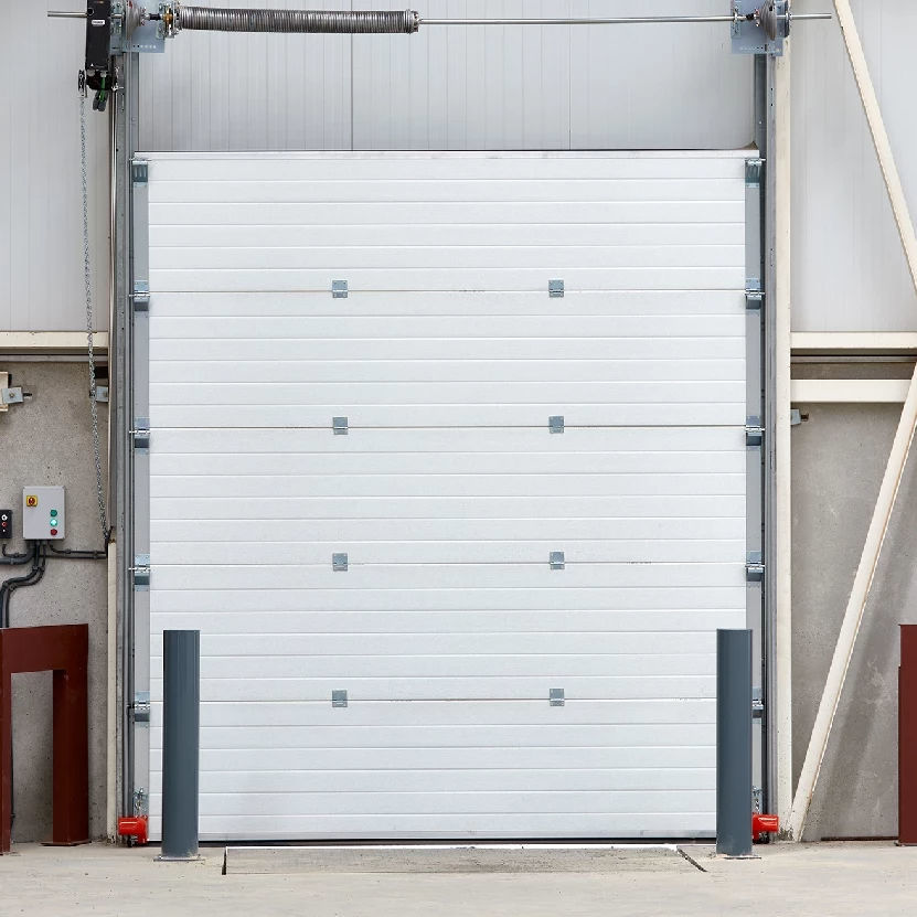 Porte industrielle sectionnelle - Manusa - en acier galvanisé / en ...