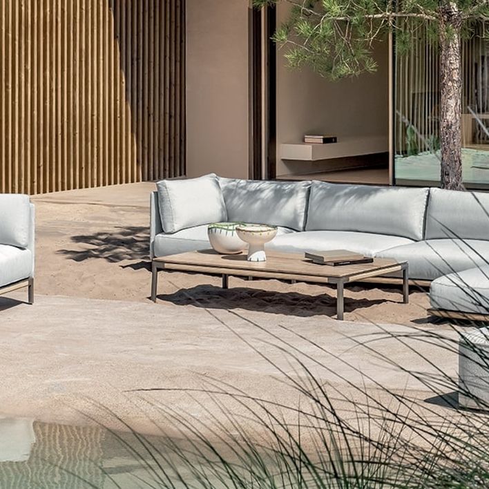 Table basse contemporaine - Baia - Ethimo - en travertin / avec piètement en aluminium ...